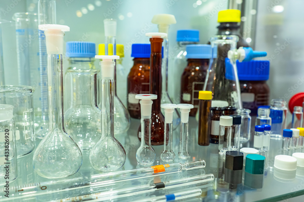 Foto de Stock Lab test tubes on a glass shelf. Various laboratory ...