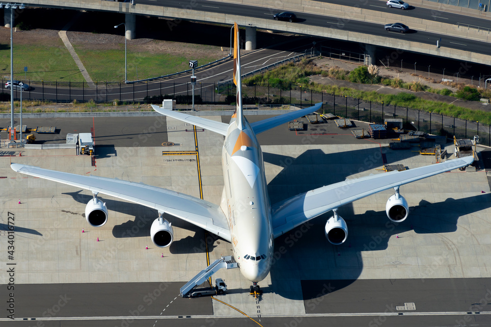 Aerial view of Etihad Airways Airbus A380. Frontal view showing four ...