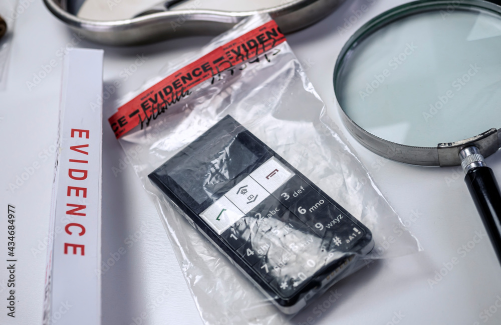 smartphone involved in lab murder, concept image Stock Photo | Adobe Stock