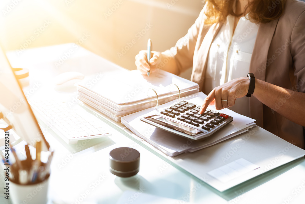 Accountant Calculating Budget And Tax Stock Photo | Adobe Stock