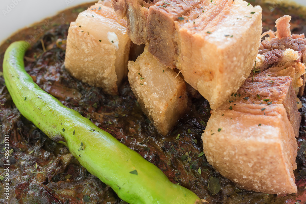 Laing topped with lechon kawali bits and Siling haba. A traditional ...