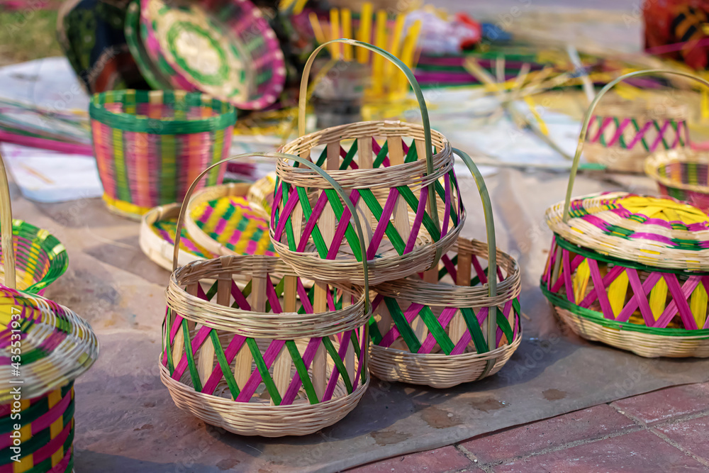 Beautiful handmade flower basket made by bamboo is displayed in a shop ...