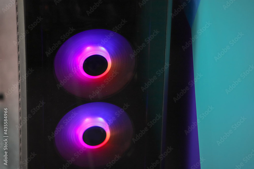 Foto de Stock Pink illumination of a cooler PC system unit. Computer ...