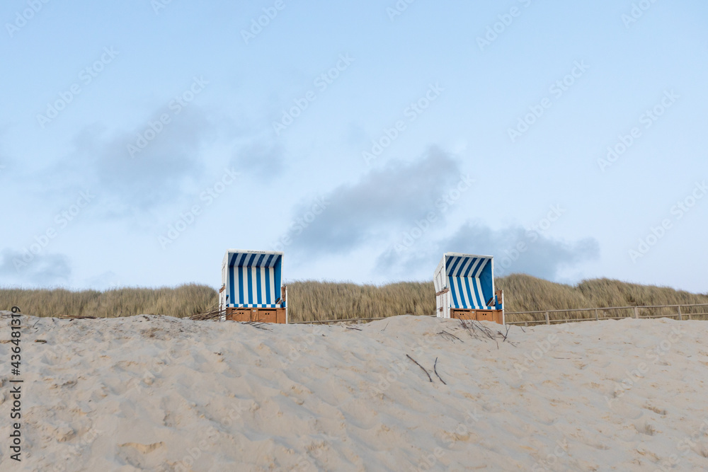 Foto de Stock Sylt island beach landscape with two empty beach chair ...