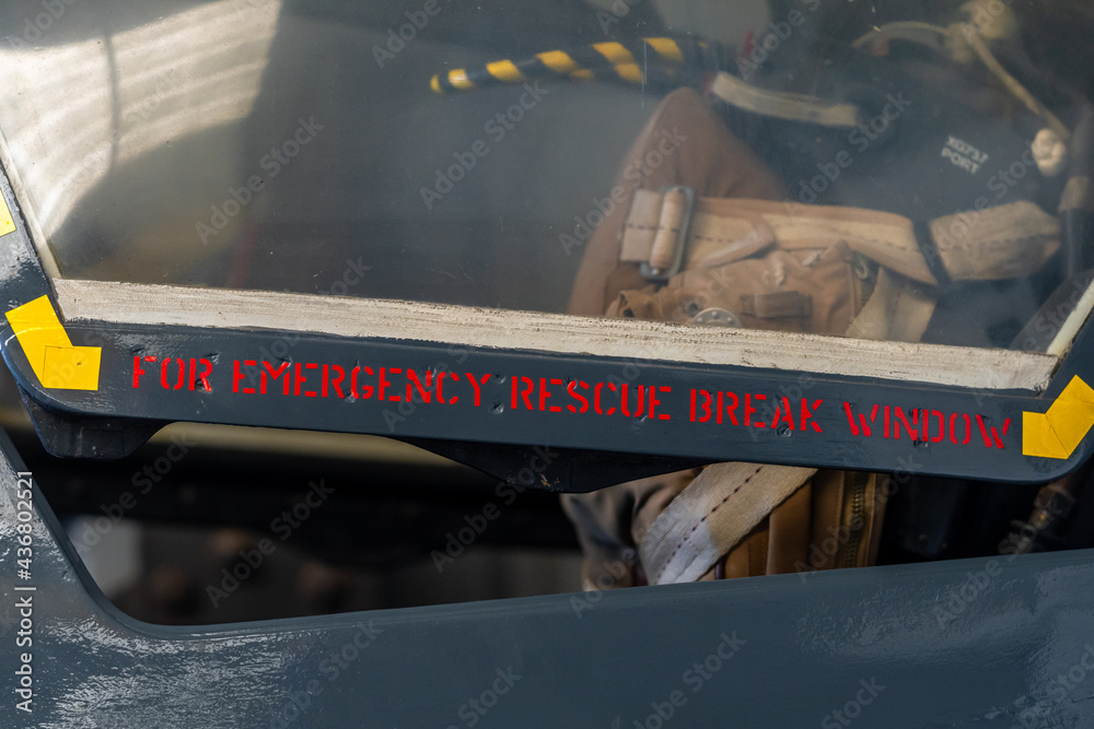 Pilots cockpit break glass in emergency to exit message on open cockpit ...