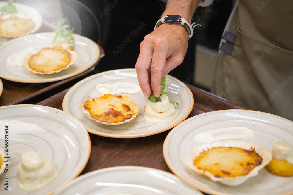 Elaboration of design dishes. Scenes of real teamwork by great Spanish ...