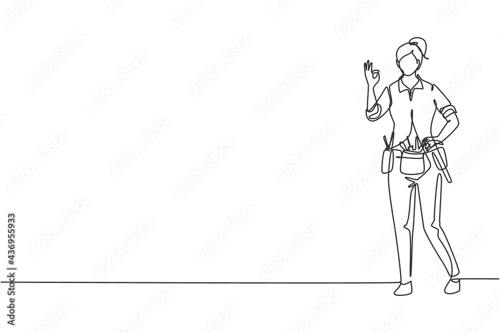 Single continuous line drawing handywoman stands with gesture okay and ...