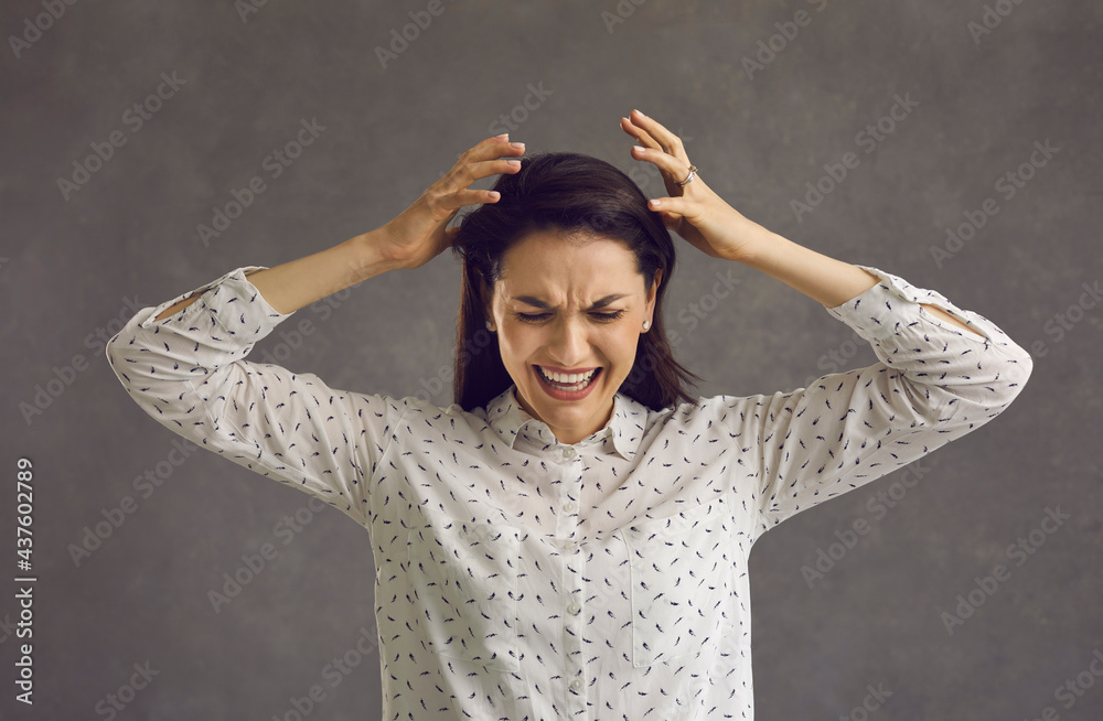 Screaming, hate, rage. Emotional angry woman in panic hysterics screams ...