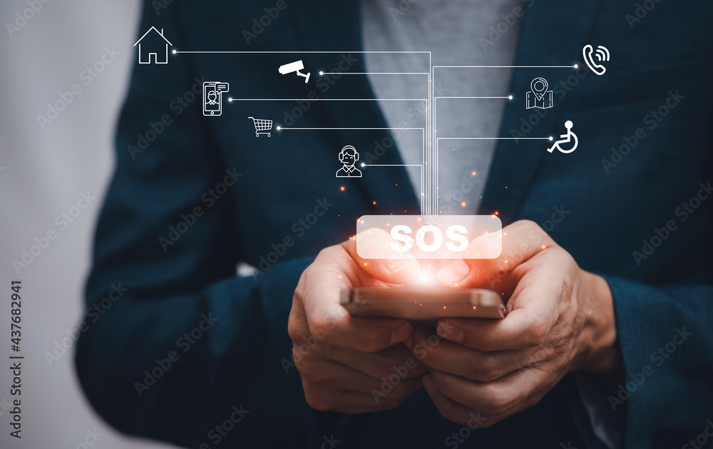 Smartphone with SOS Disabled App concept, businessman holding mobile ...