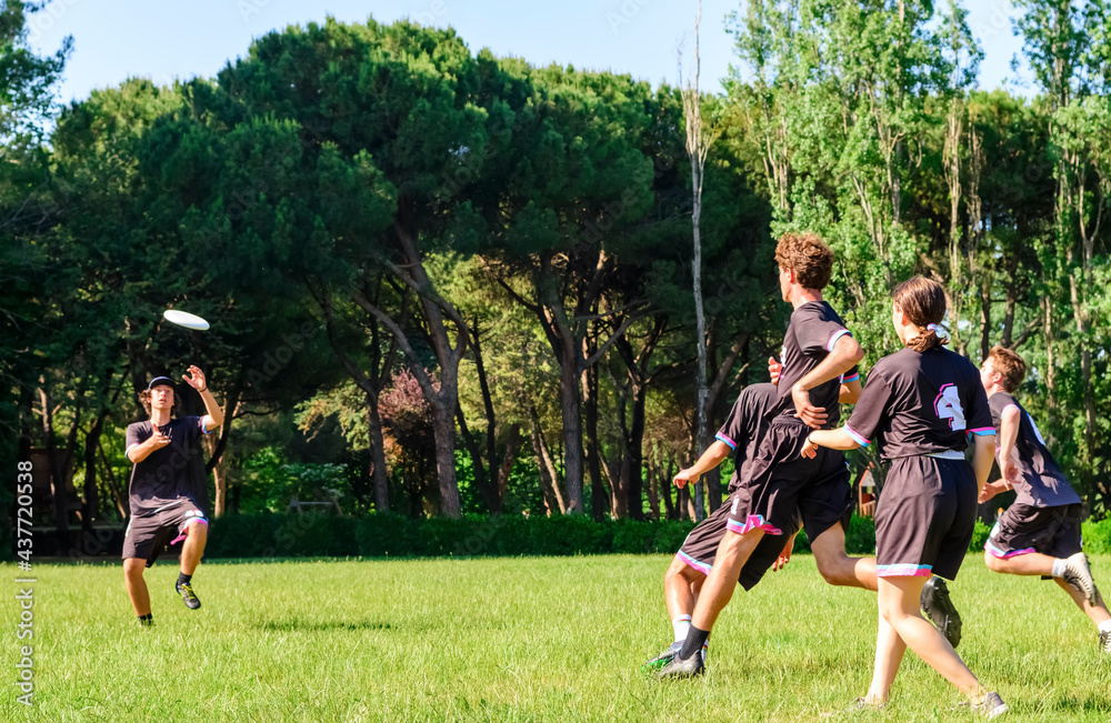 Photo Stock Group of young teenagers people in team wear playing a ...