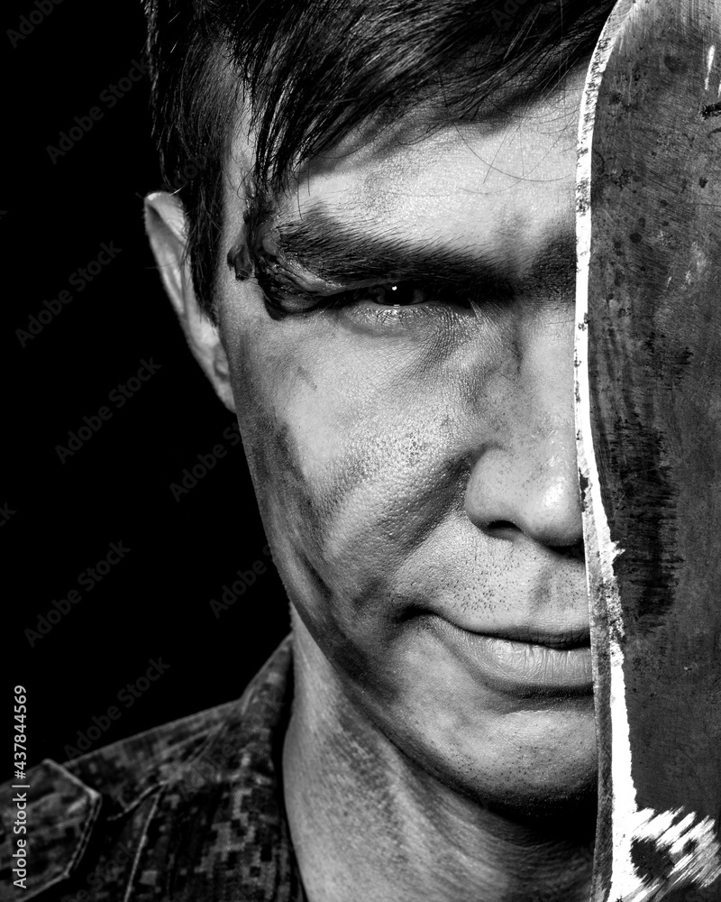 Black white portrait of the soldier in combat coloring, scars and ...