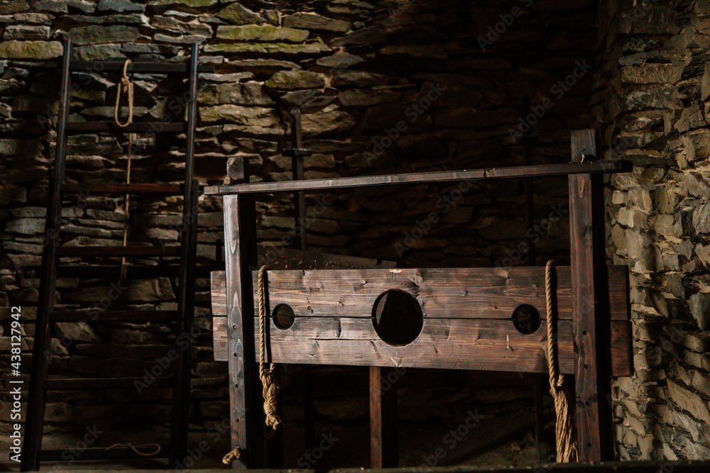 Vintage medieval Torture Equipment in museum, Rack, break-knee, Torture ...