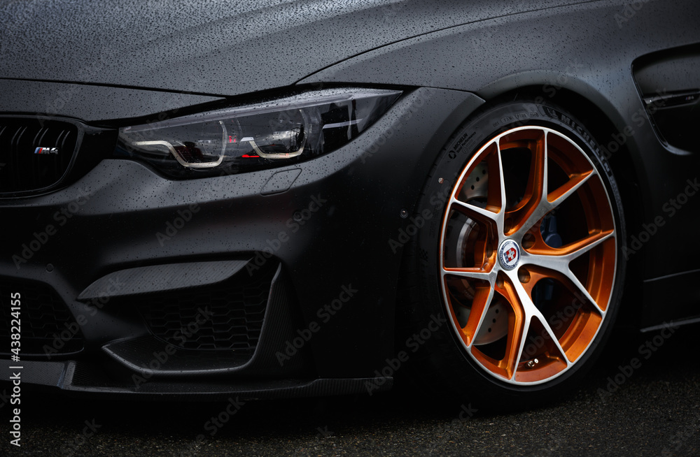 BMW M4 F83 wrapped in matte black vinyl wrap and equipped with custom ...