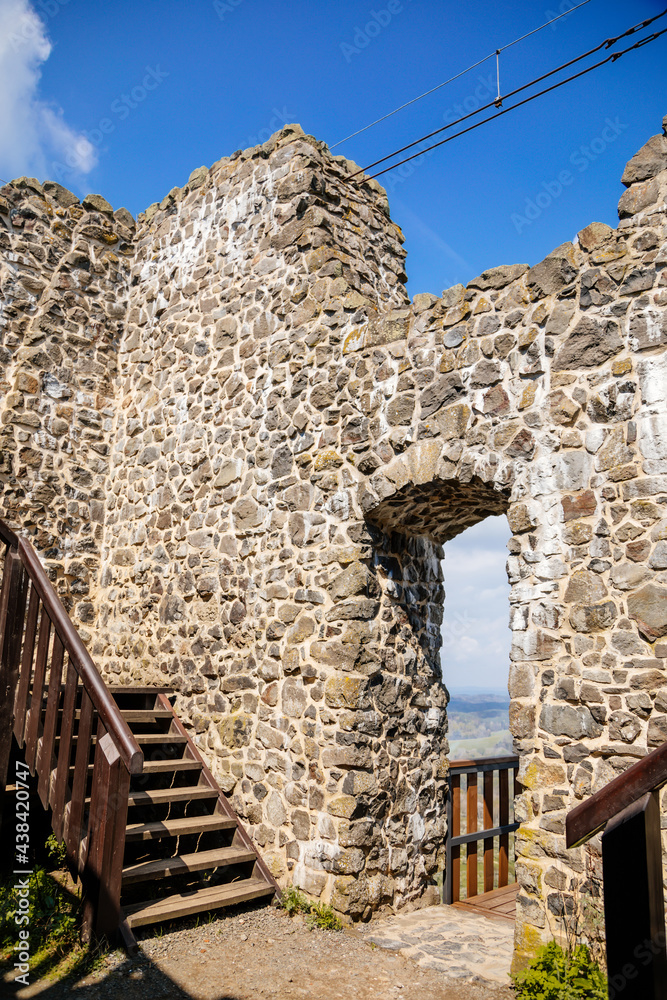 Medieval gothic castle Trosky at two basalt volcanic plugs, tower on ...