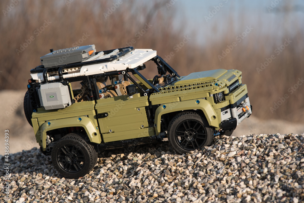 Lego set as road vehicle Land Rover Defender in nature. Lego bricks as ...