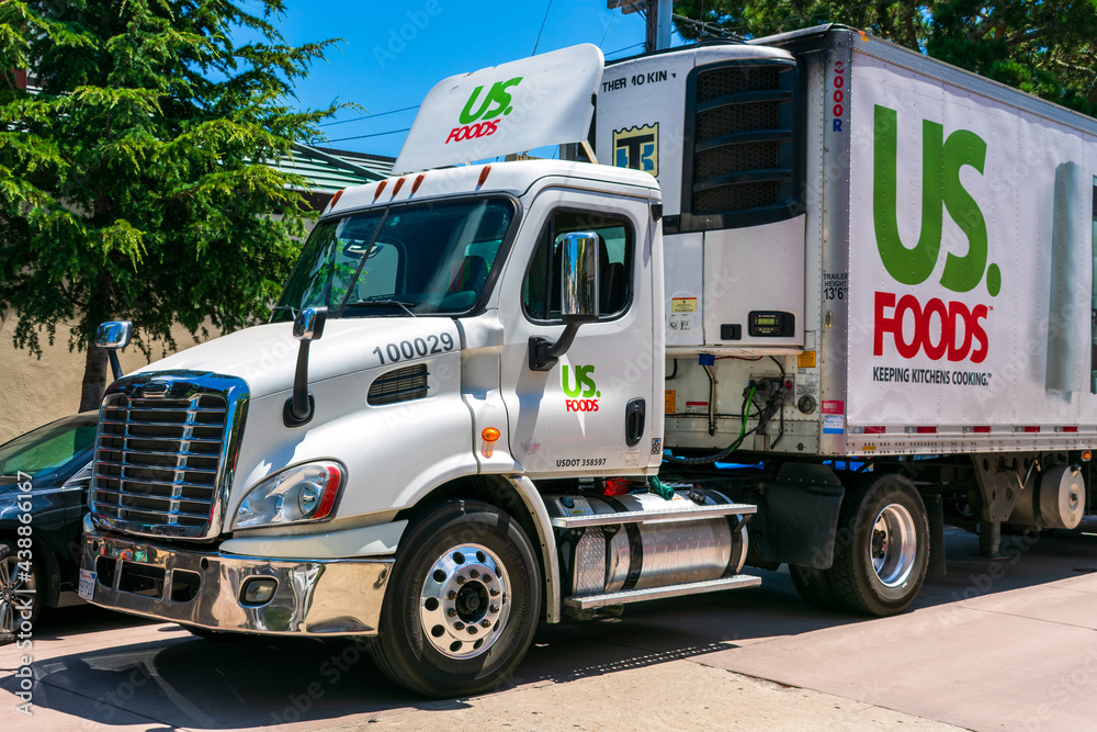 US Foods logo on delivery truck. Keeping kitchen cooking slogan. US ...