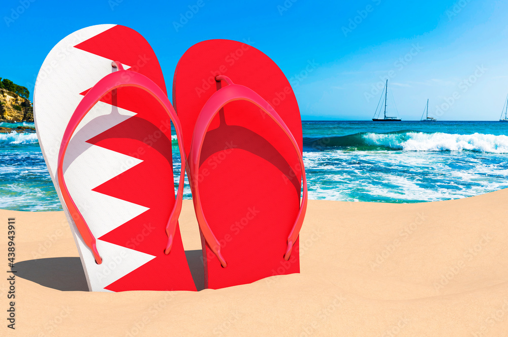 Flip flops with Bahraini flag on the beach. Bahrain resorts, vacation ...