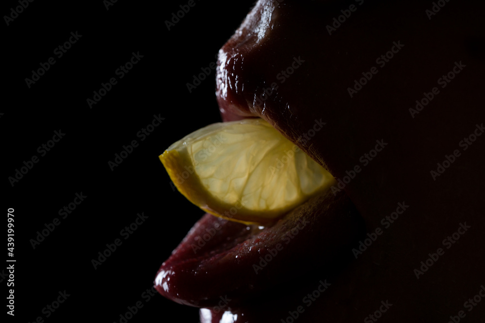 Sexy woman lips with lemon. Close up female mouth and sensual lips with ...
