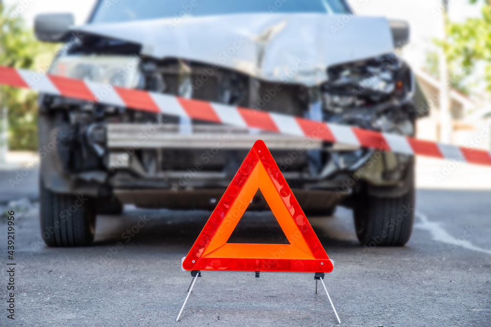 Red emergency stop triangle sign and Red warning police tape afore ...