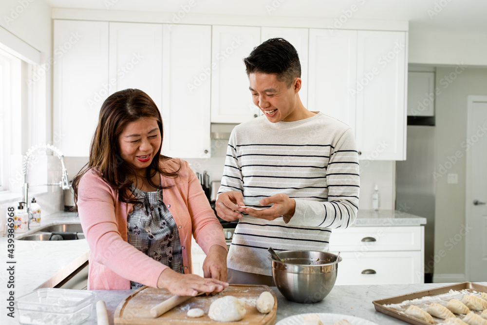 Son and Mother Cook Together Stock Photo | Adobe Stock