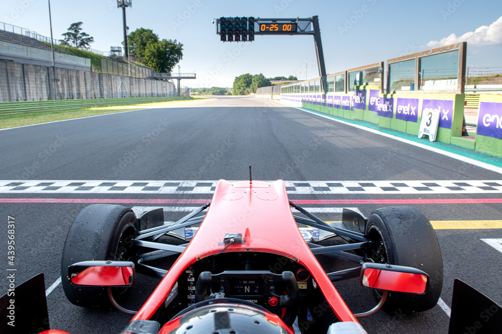 Empty asphalt circuit track from racing car driver point of view ...