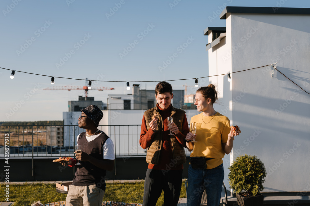 Male friends chilling together on terrace Stock Photo | Adobe Stock