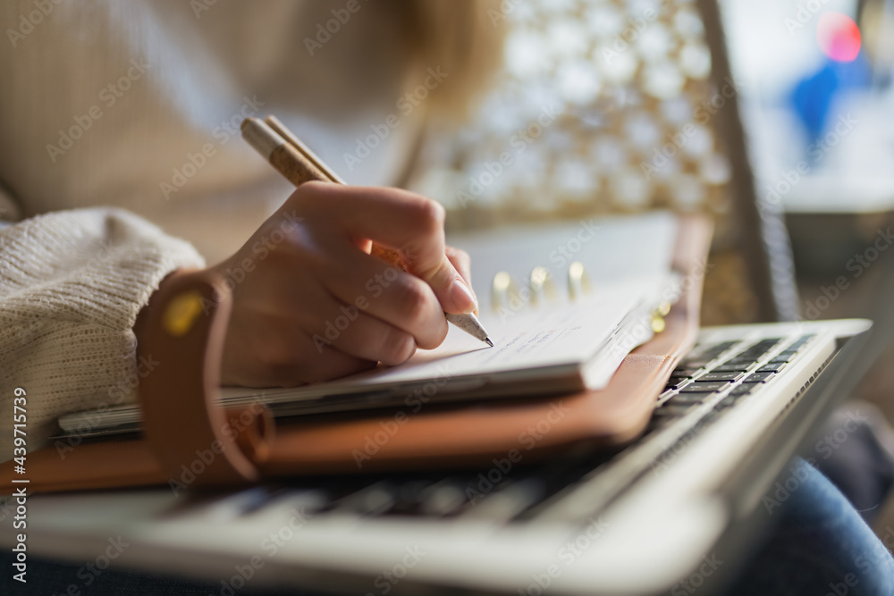 Taking note Stock Photo | Adobe Stock