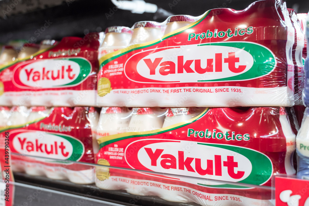 Foto de Stock Yakult is a Japanese sweetened probiotic milk beverage fermented with the bacteria ...