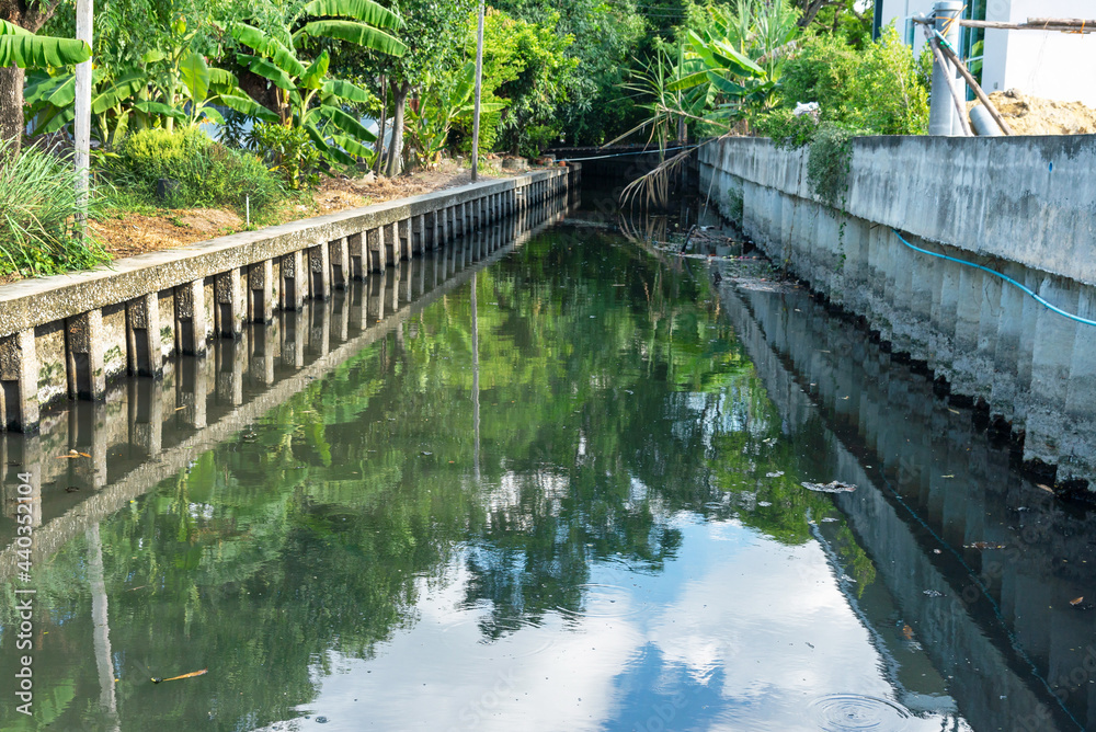 Dirty waste dark black stink bad water smell from city under water ...