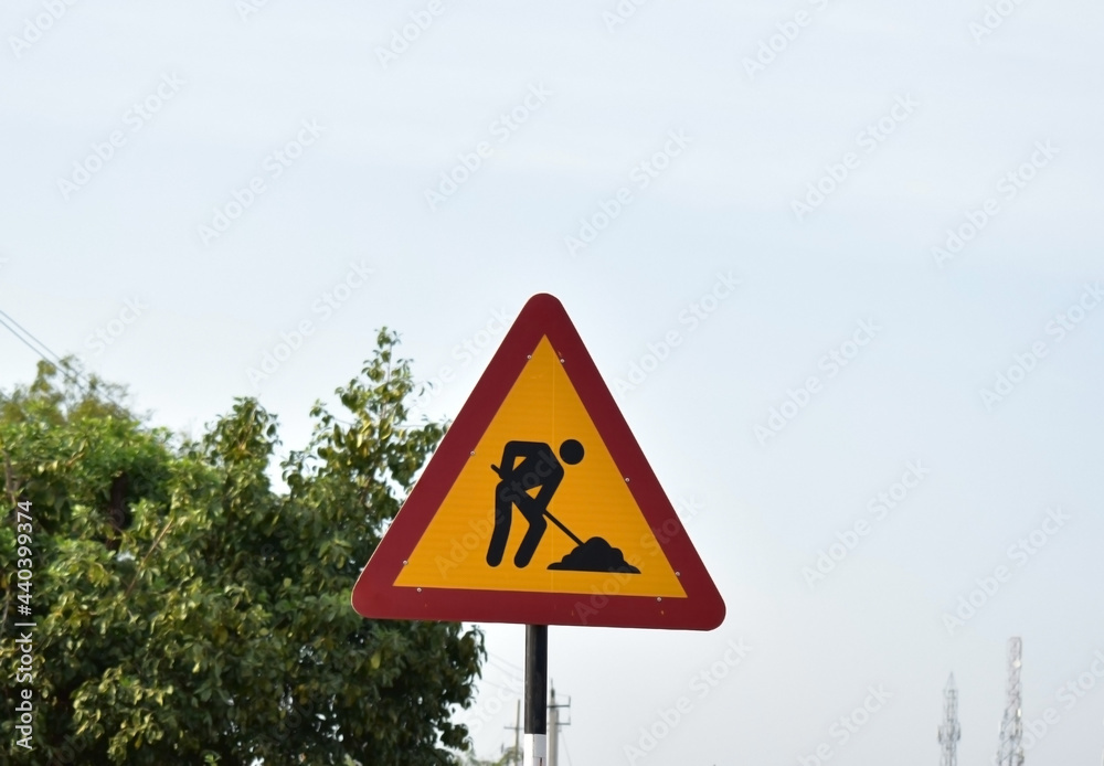 Men at work warning sign board Stock Photo | Adobe Stock