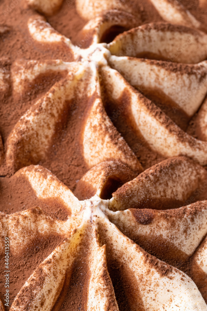Frozen Tiramisu flavour gelato - full frame detail. Close up of creamy ...