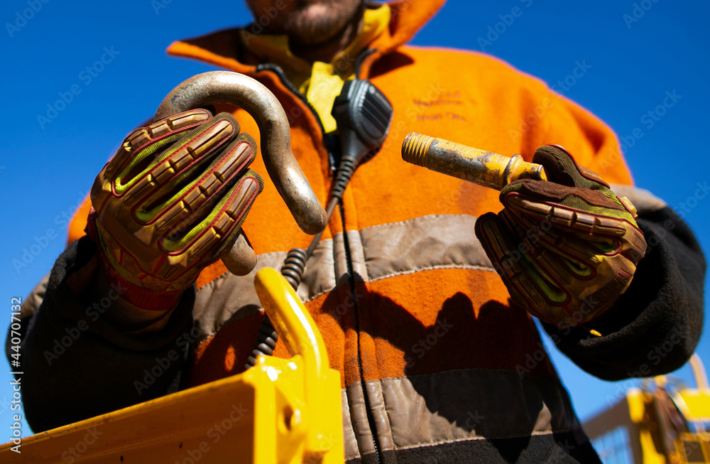 Safety workplace close up image of trained competent rigger high risk ...
