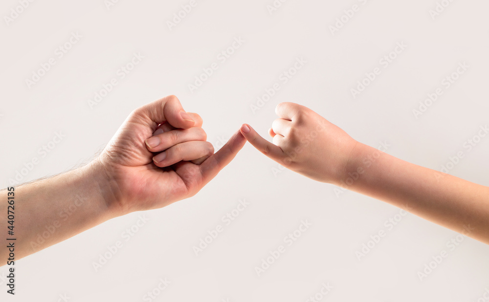 Stock-Foto „Friendship of generations. Father, daughter hand making ...