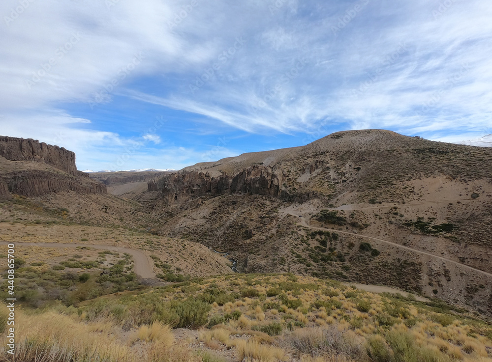 The Andes mountain range. View of the arid mountains, hills, yellow ...