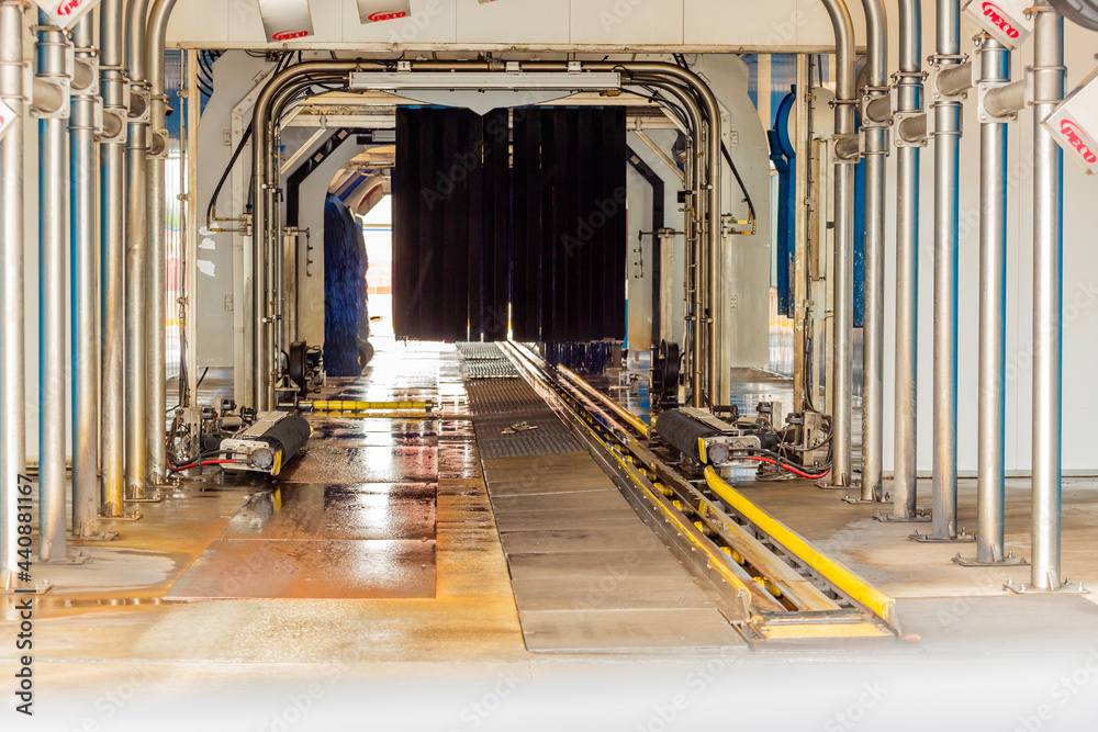 Automatic car wash with track and no cars inside Stock Photo | Adobe Stock