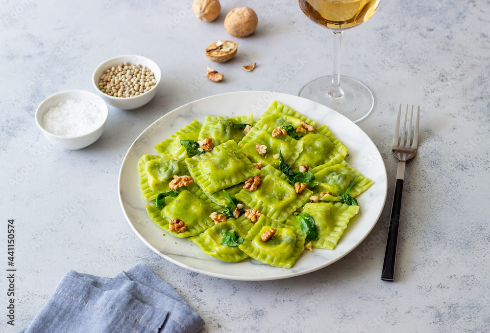 Green ravioli with ricotta cheese, spinach and nuts. Healthy eating ...