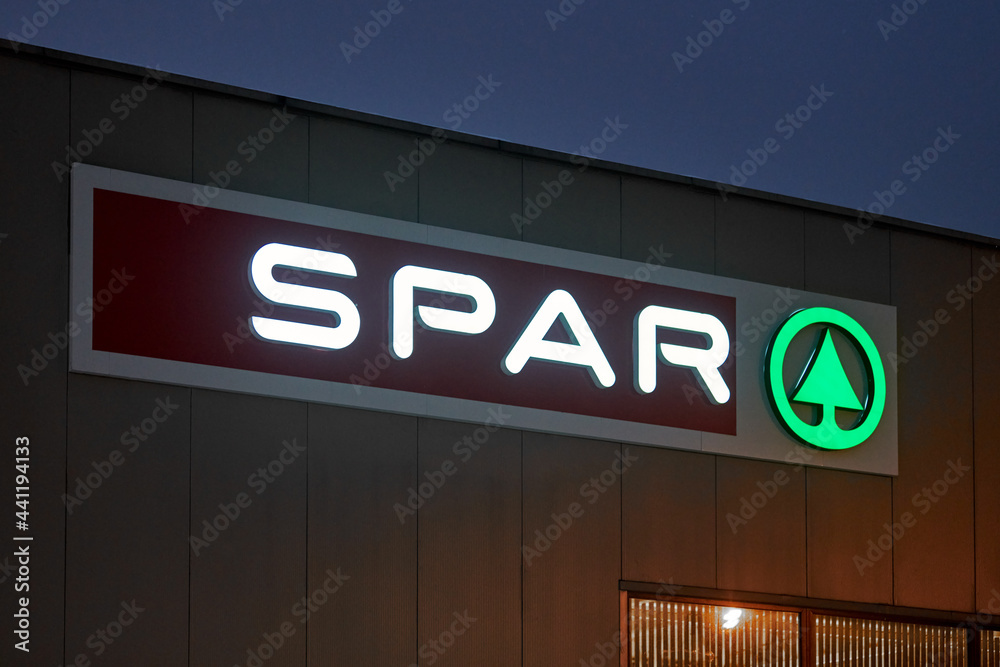 Spar logo on one of supermarkets, signboard Stock Photo | Adobe Stock