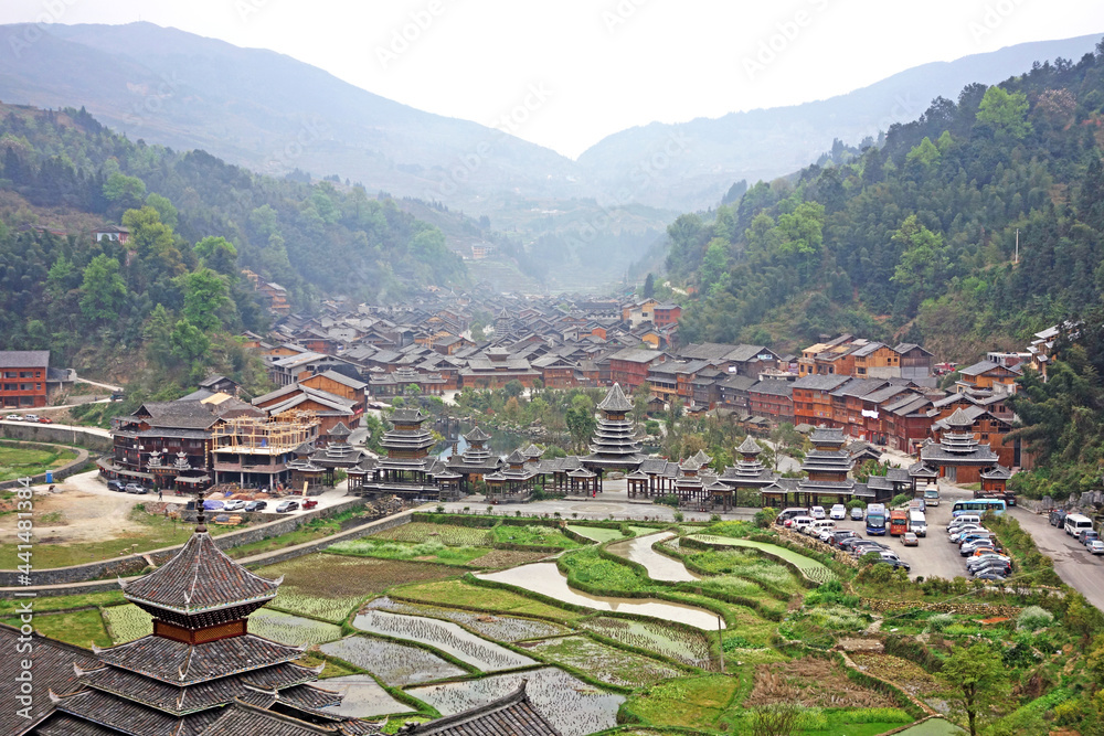 Zhaoxing Dong Zai ancient town (Zhao Xing Village) in the morning mist ...