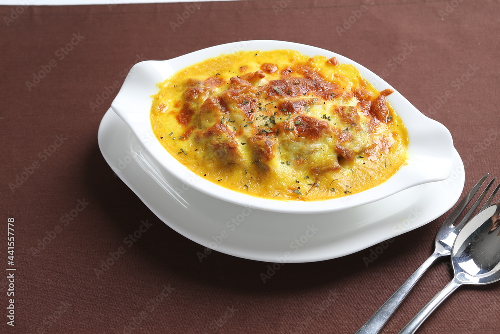 oven baked creamy cheese Japanese curry pasta with chicken in bowl ...