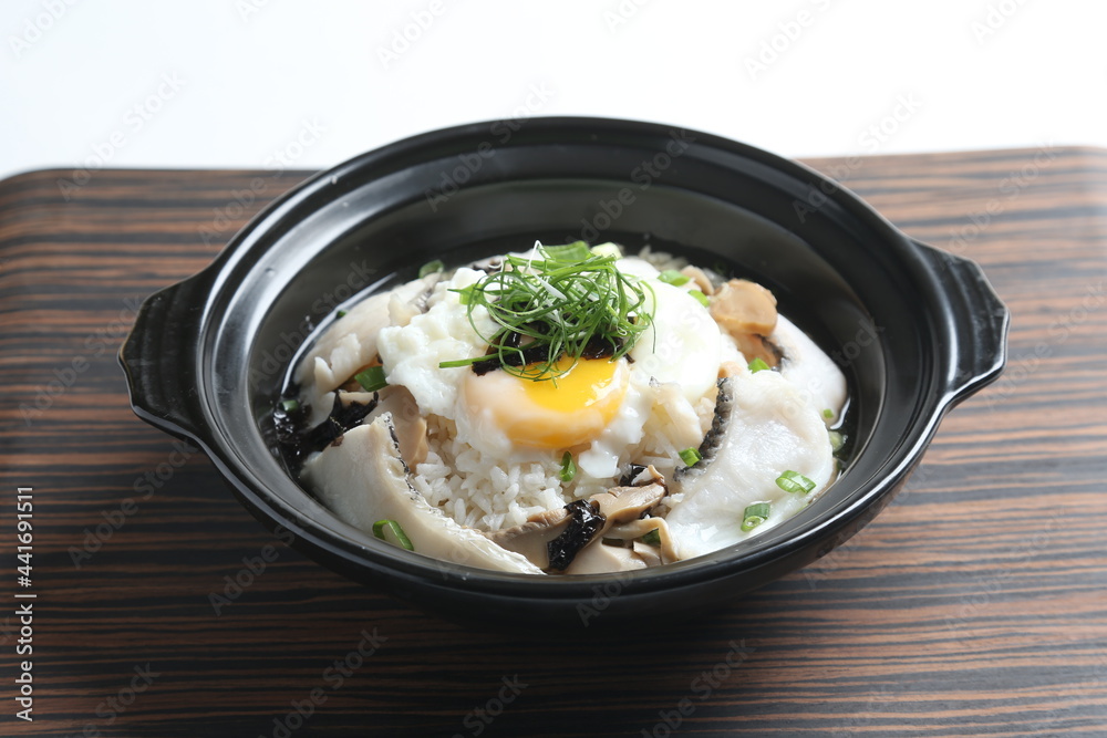 chef cook Hong Kong congee porridge with mixed seafood unagi, fish ...