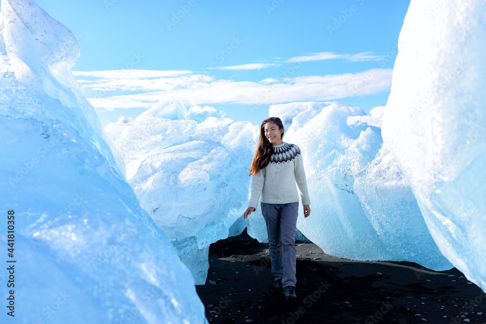 Iceland Amazing landscape at Iceberg beach. Tourist by icebergs on Ice ...