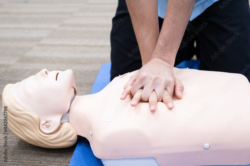 Demonstrating CPR (Cardiopulmonary resuscitation) training medical ...