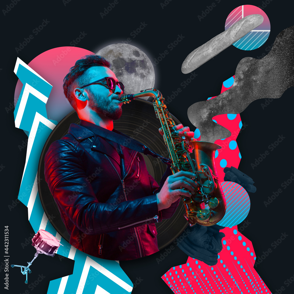 Young man playing saxophone isolated over black red blue abstract ...