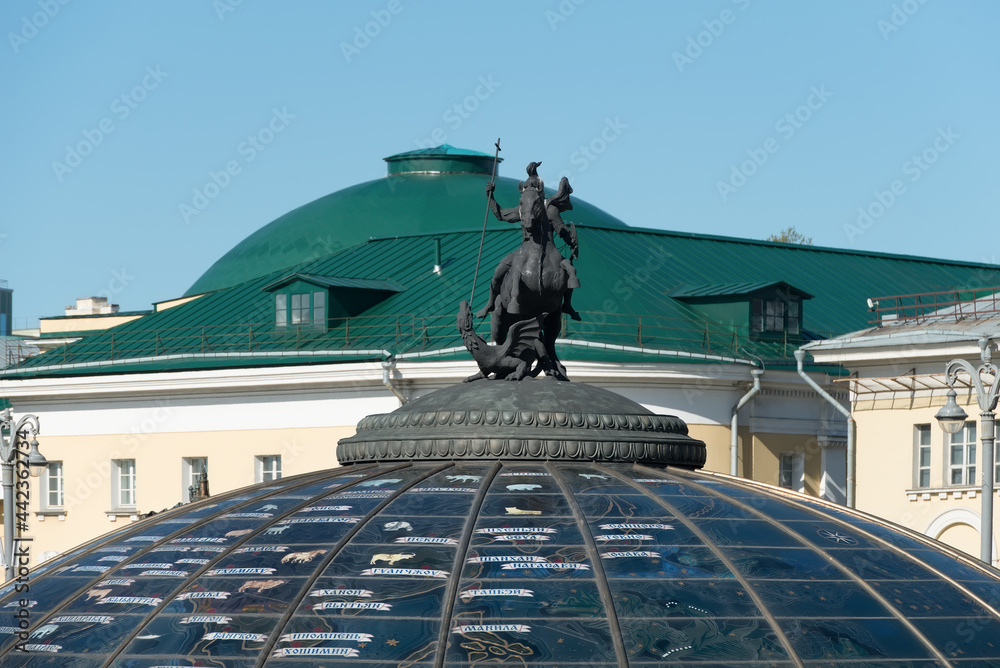 Saint George strikes the Serpent with a spear. St. George the ...