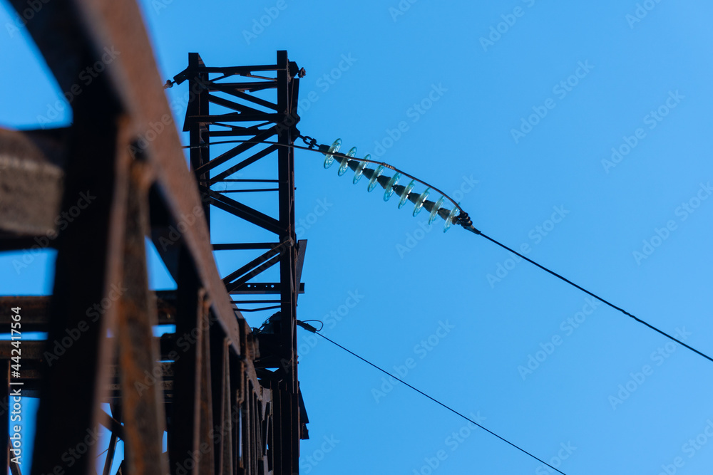 Rusted steel power transmission tower in Ukraine with high-voltage ...