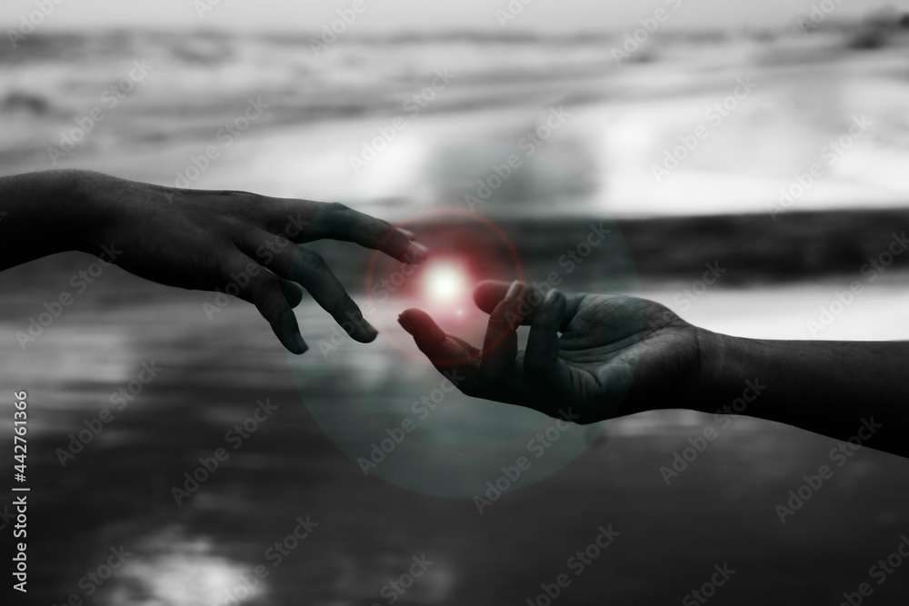 Helping hands abstract art in black and white background. Hands of two ...