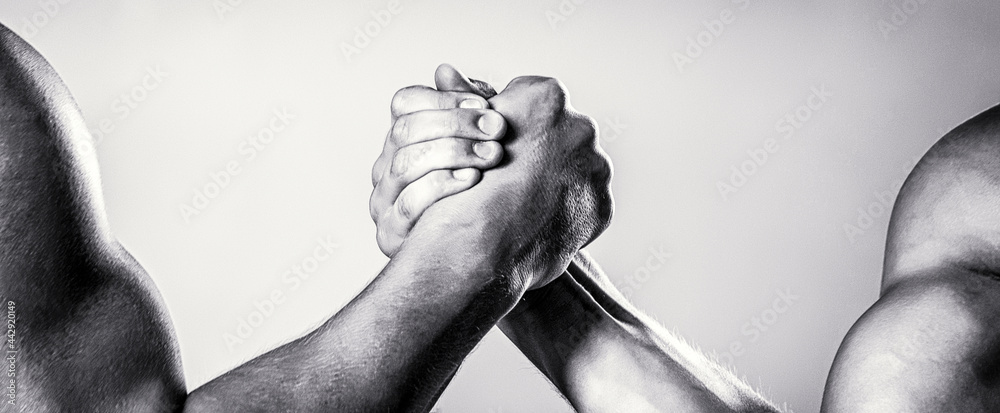 Rivalry, closeup of male arm wrestling. Two hands. Men measuring forces ...
