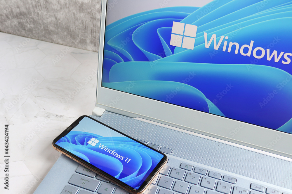 Foto de Stock New Microsoft Windows 11 logo on computer screen and ...