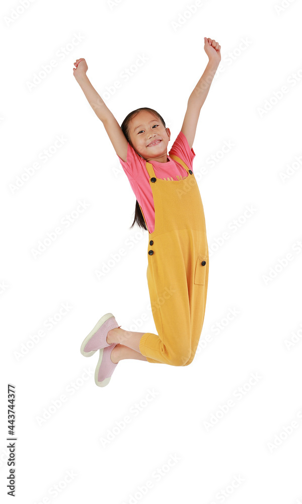 Asian little girl child jumping and freedom movement on air isolated ...