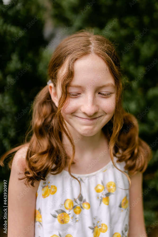 portrait of beautiful tween with red hair Stock Photo | Adobe Stock